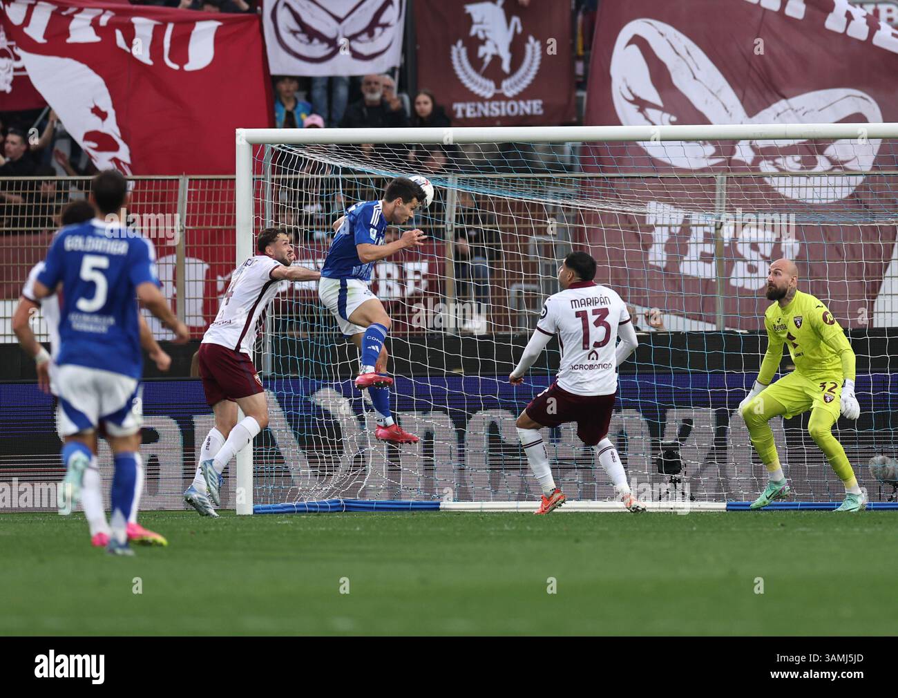 Como, Italy. 13th Apr, 2025. Como's Anastasios Douvikas (3rd R) scores ...