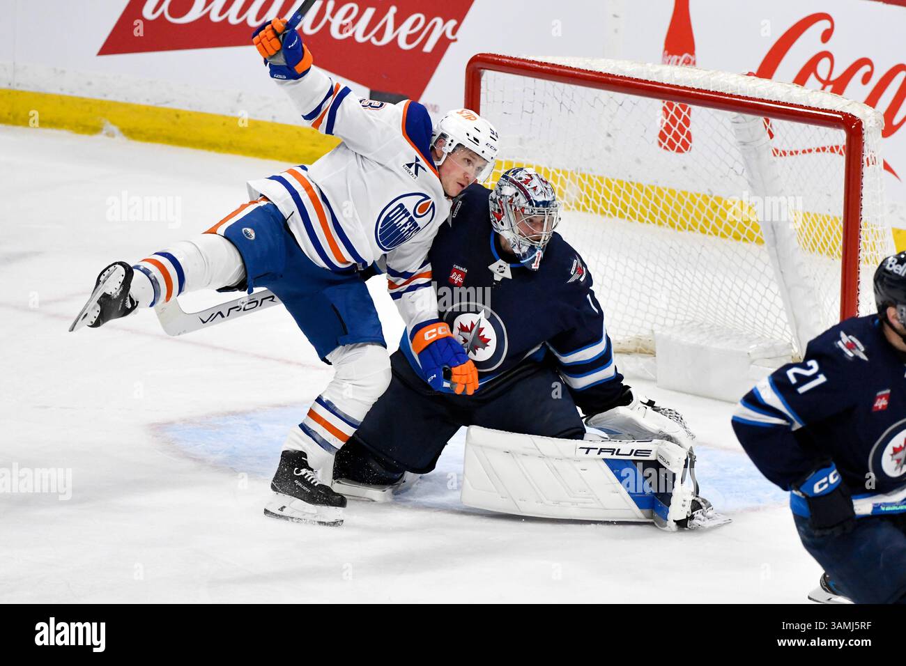 Edmonton Oilers' Jeff Skinner (53) collides with Winnipeg Jets ...