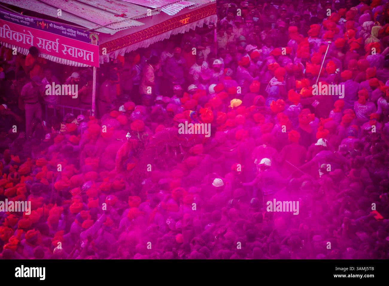 April 12, 2025, Kolhapur, Maharashtra, India: People throw Gulal a red ...