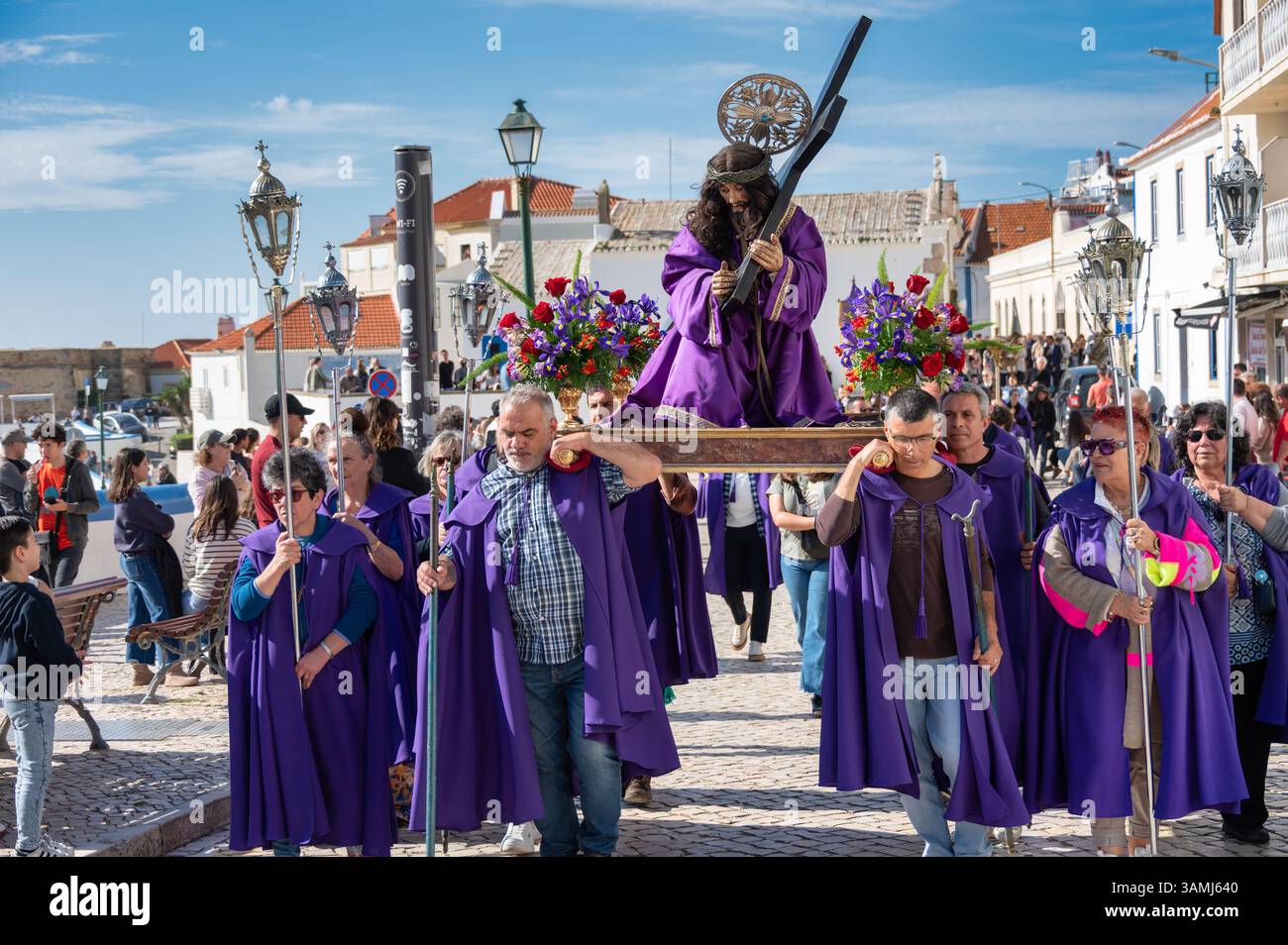 Participants carry a religious float during the Holy Week procession of ...