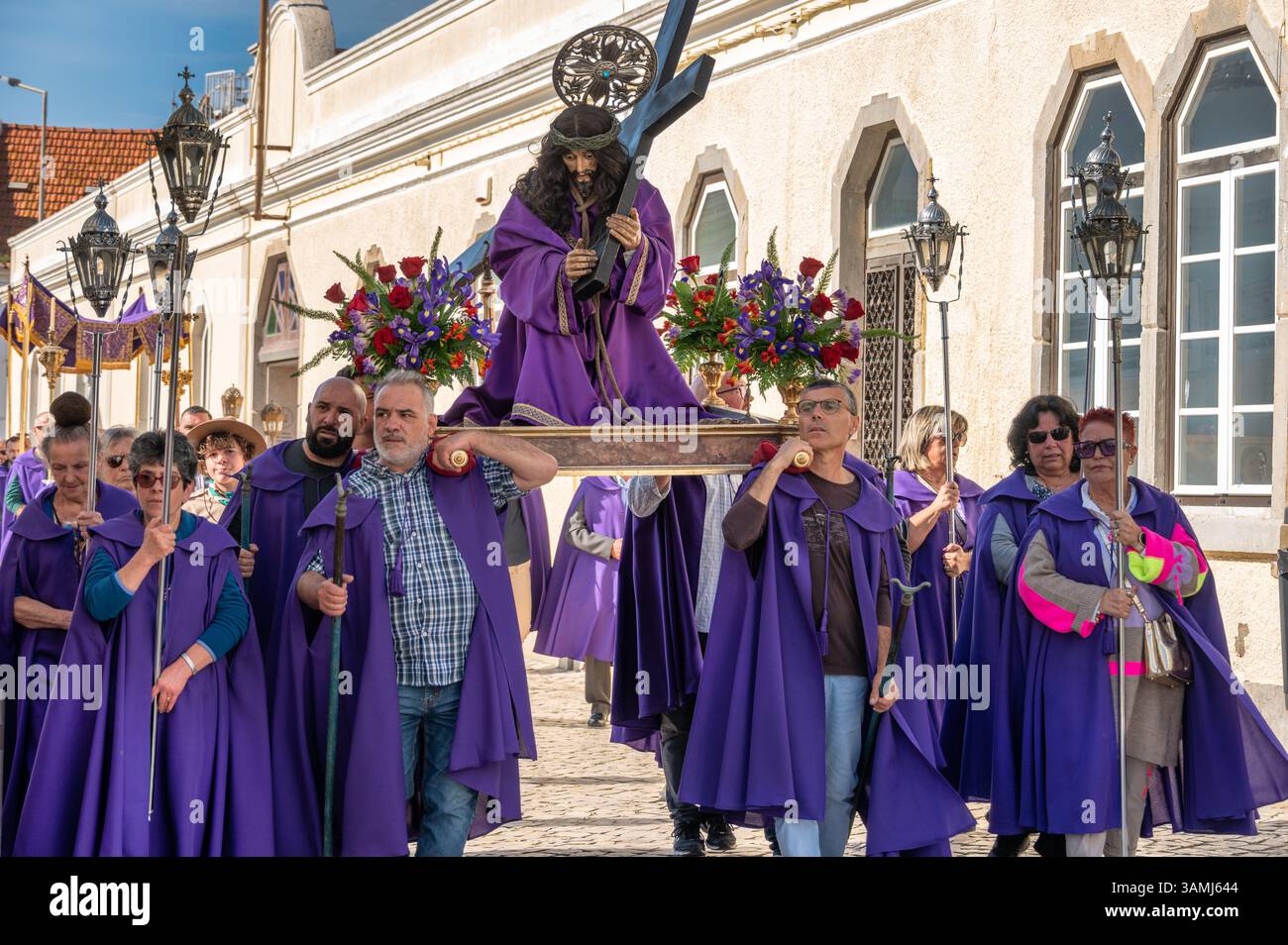 Participants carry a religious float during the Holy Week procession of ...