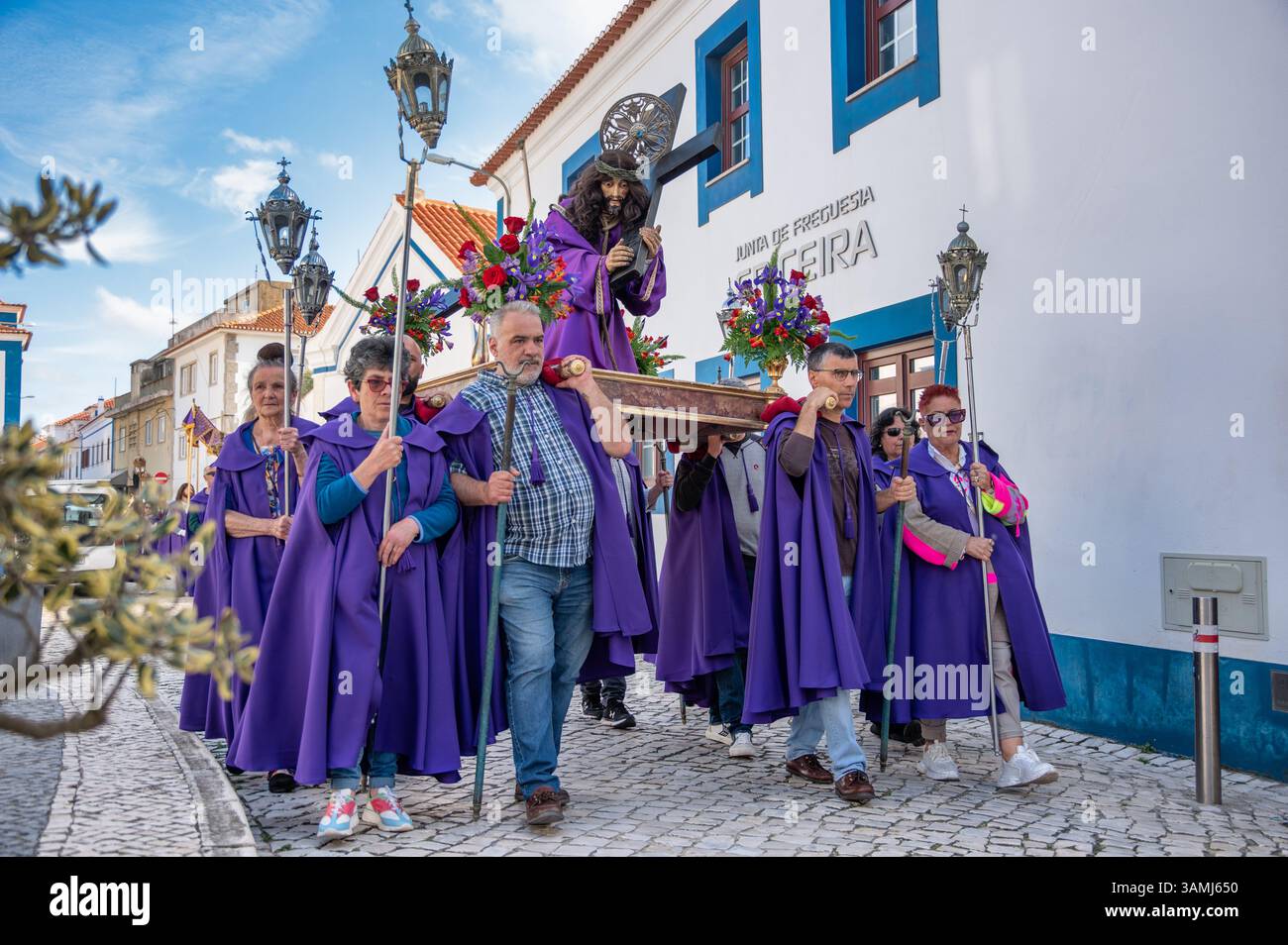Participants carry a religious float during the Holy Week procession of ...