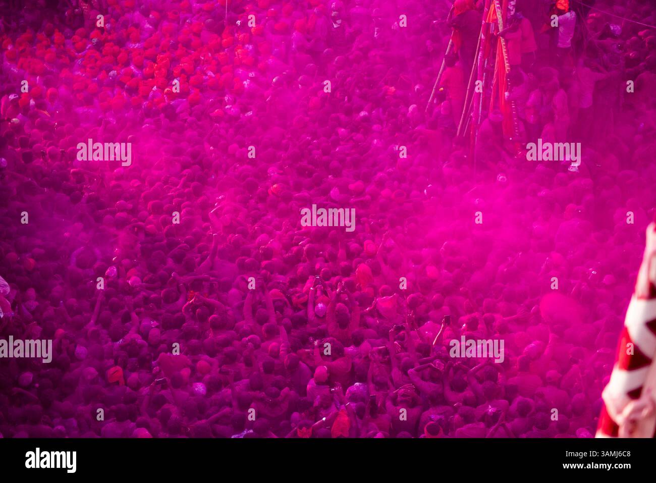 April 12, 2025, Kolhapur, Maharashtra, India: People throw Gulal a red ...