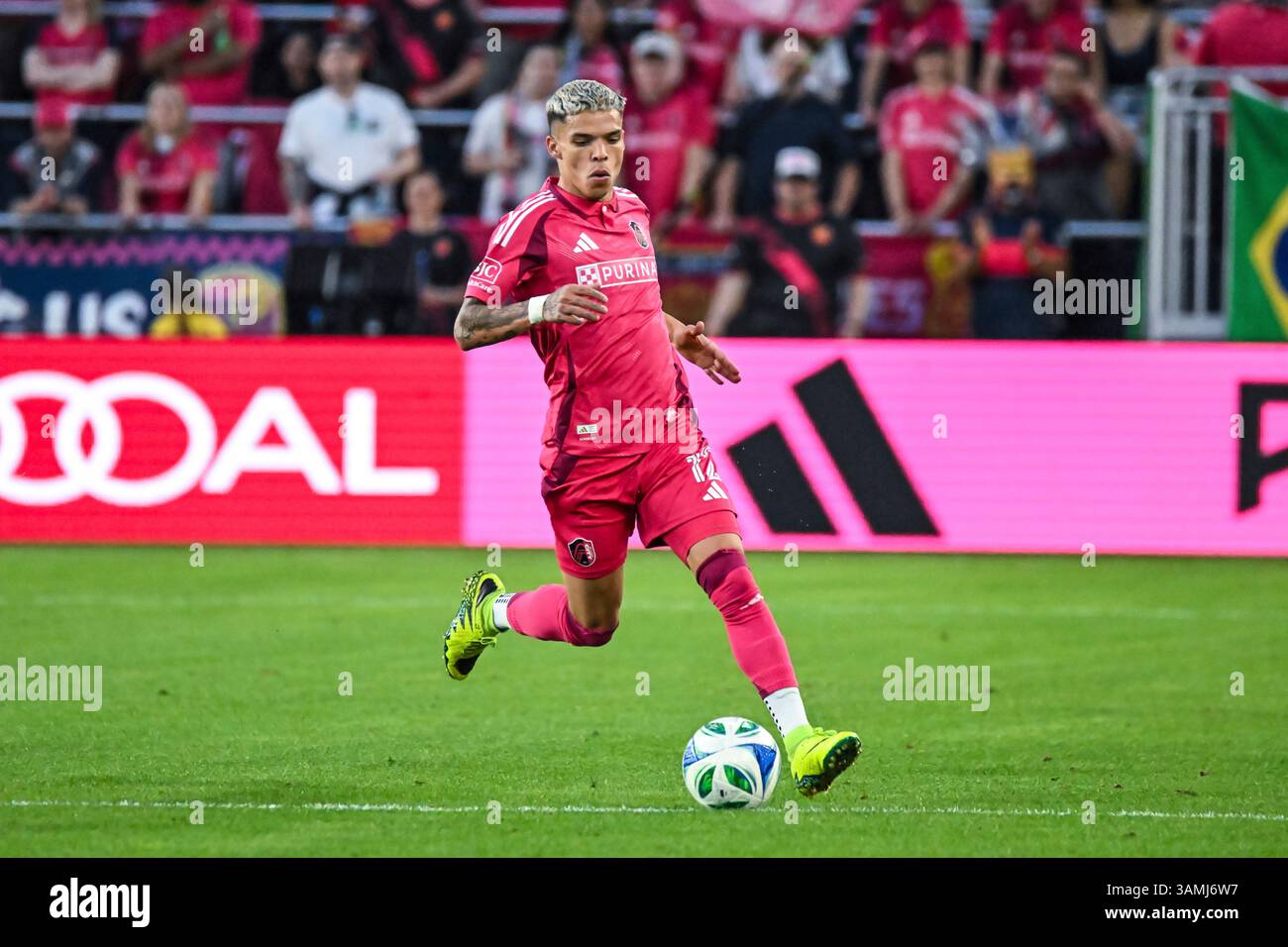 ST. LOUIS, MO - APRIL 13: Celio Pompeu (12) of St. Louis City runs down ...