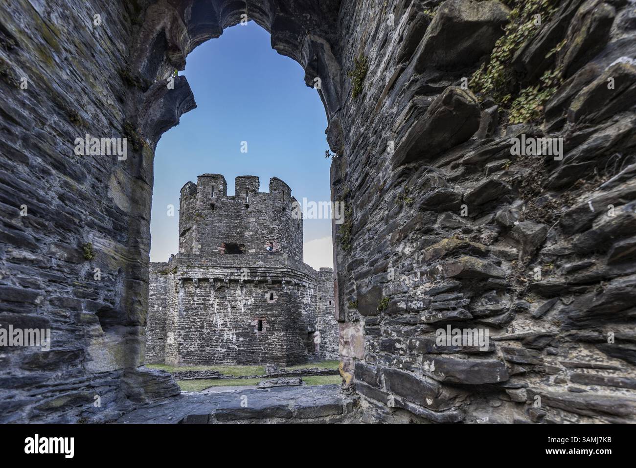 Conwy Castle, view through a window-like opening in the castle wall to ...