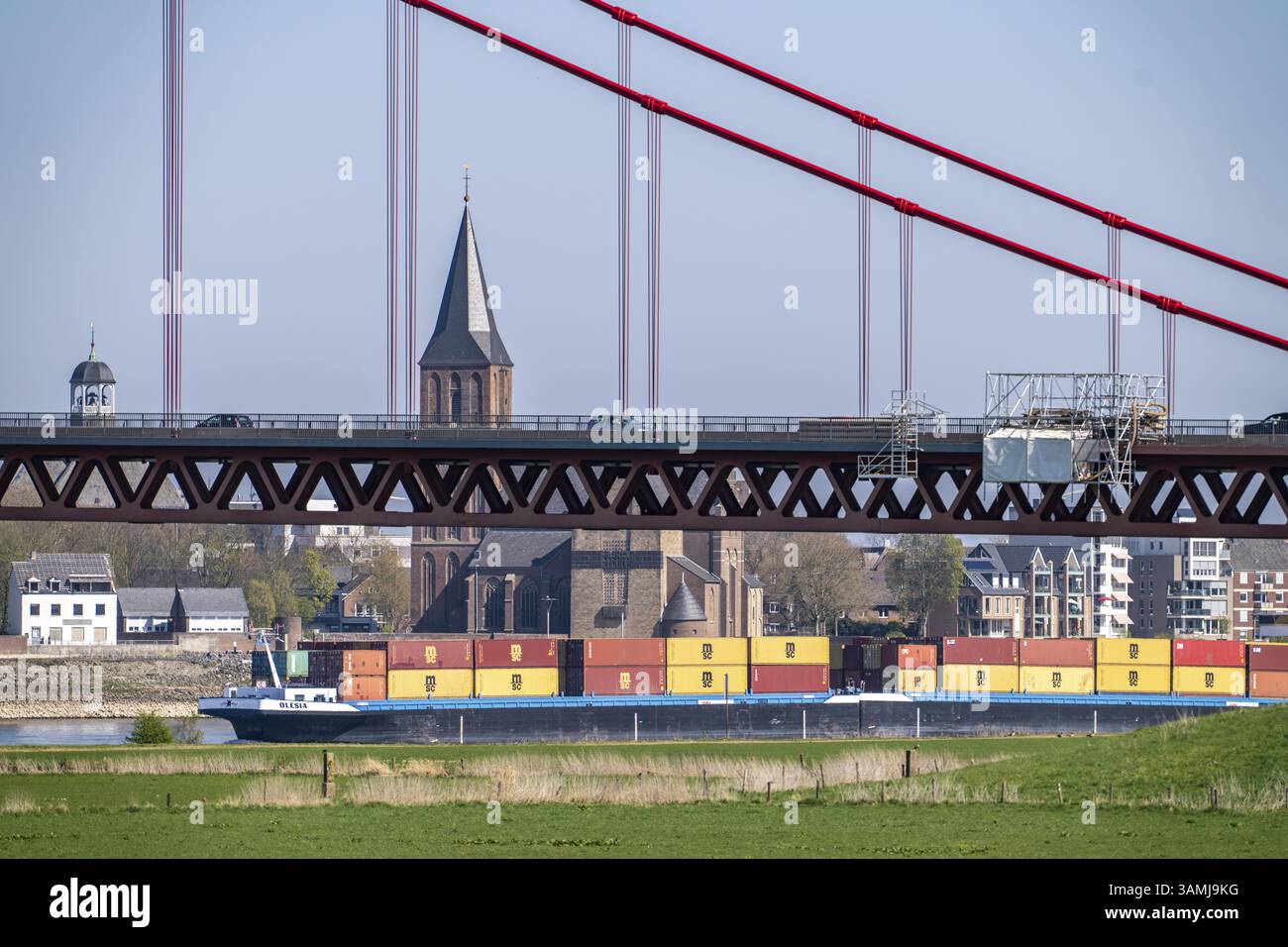 Cargo ship transports containers towards hi-res stock photography and ...