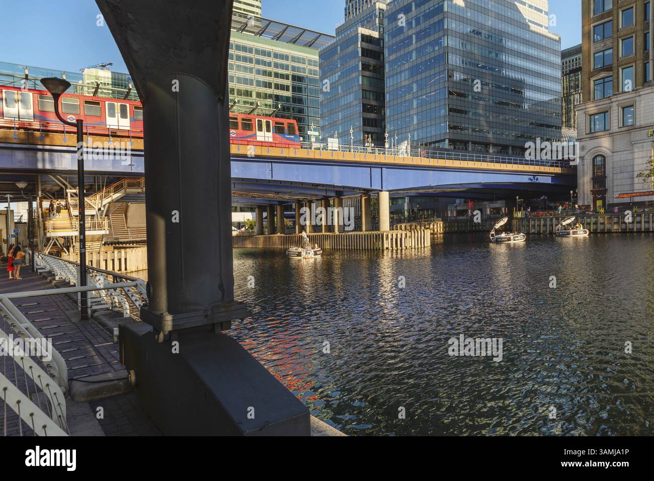 Pleasure boats on the Thames at Crossrail Station, Canary Wharf, London ...
