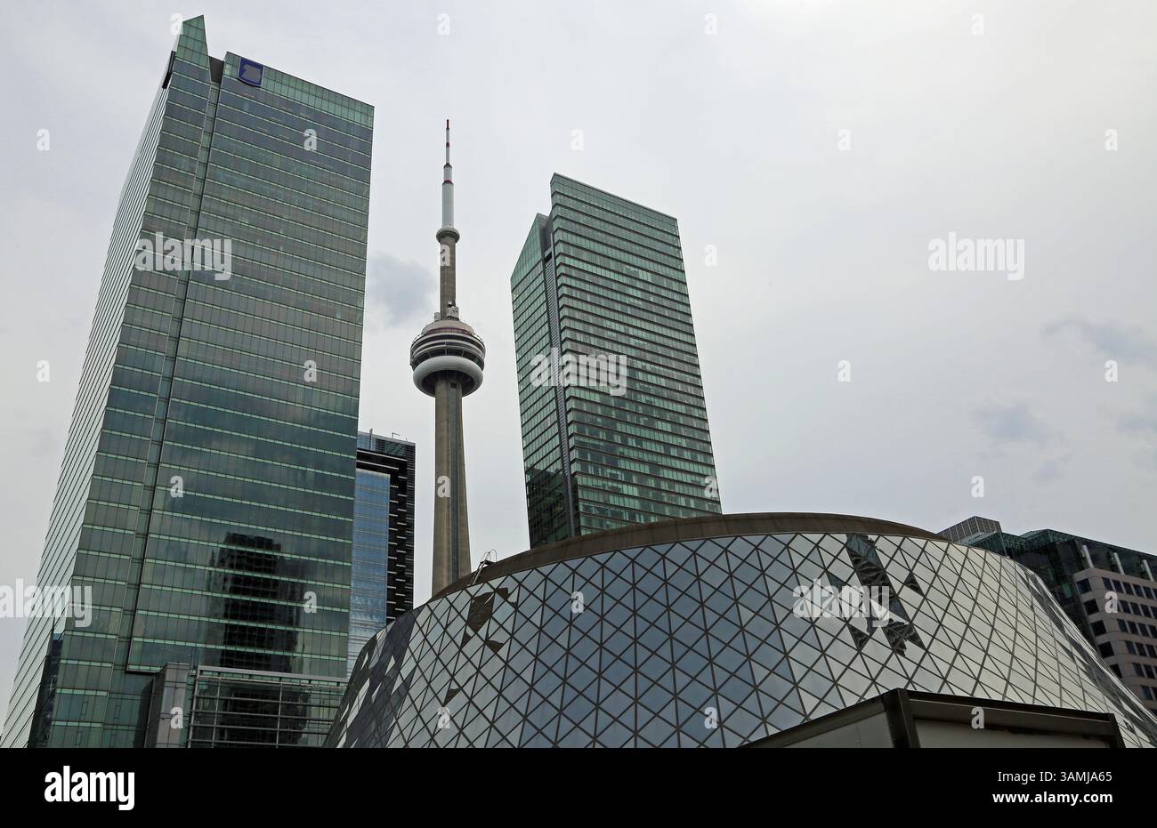 CN Tower between building, Toronto, Canada Stock Photo - Alamy