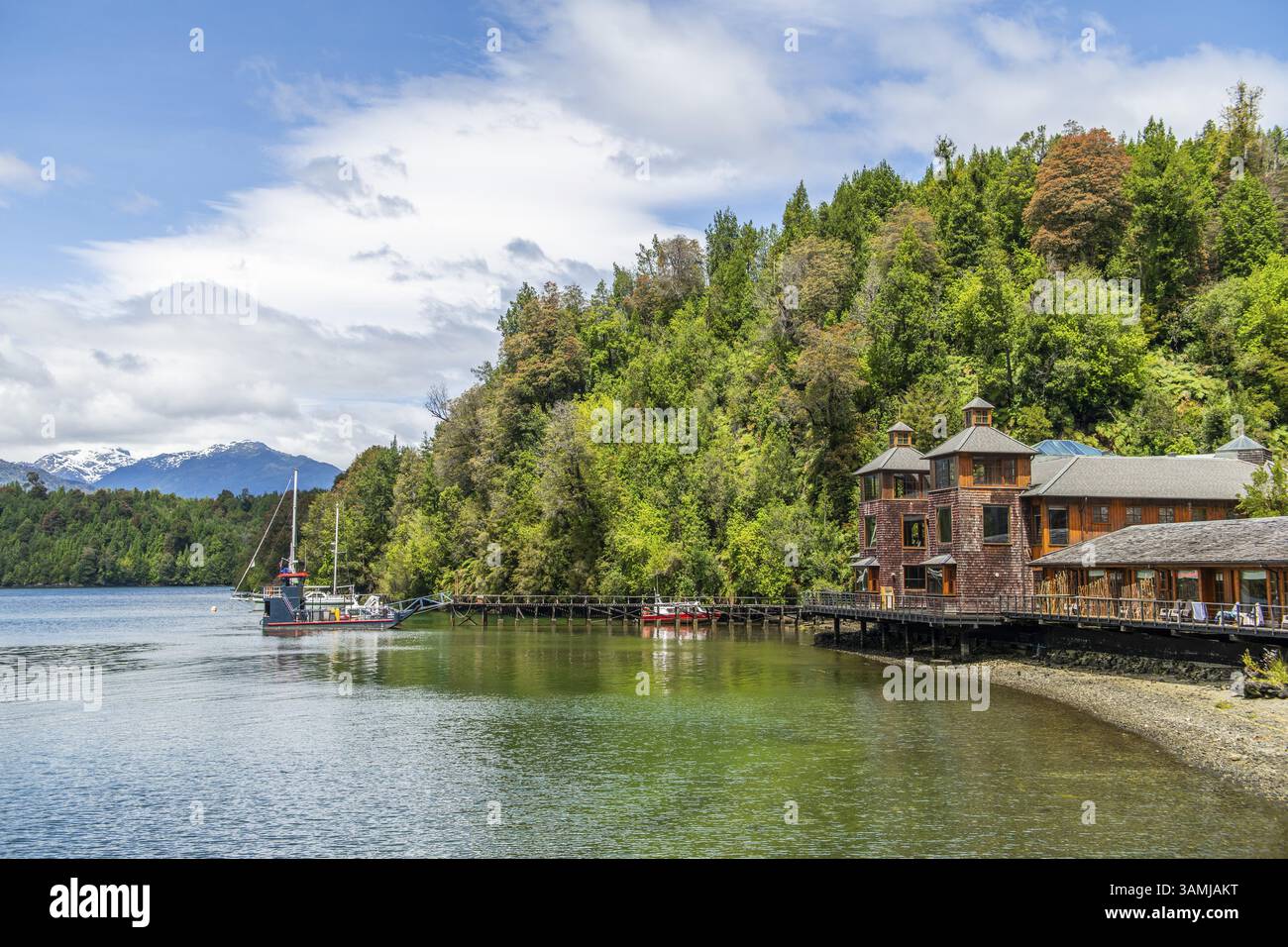 Puyuhuapi Lodge built from wood and shingles on the banks of the ...