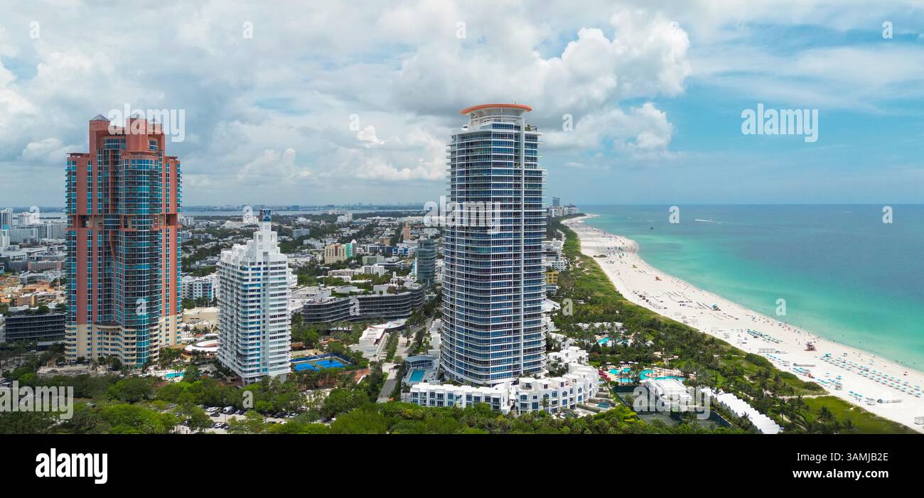 Miami cityscape with luxury skyscrapers and ocean. Panoramic drone view ...
