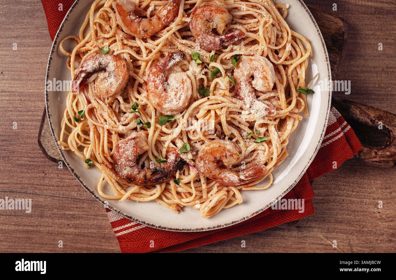 Spaghetti with tiger prawns, in tomato sauce, homemade, top view, no ...