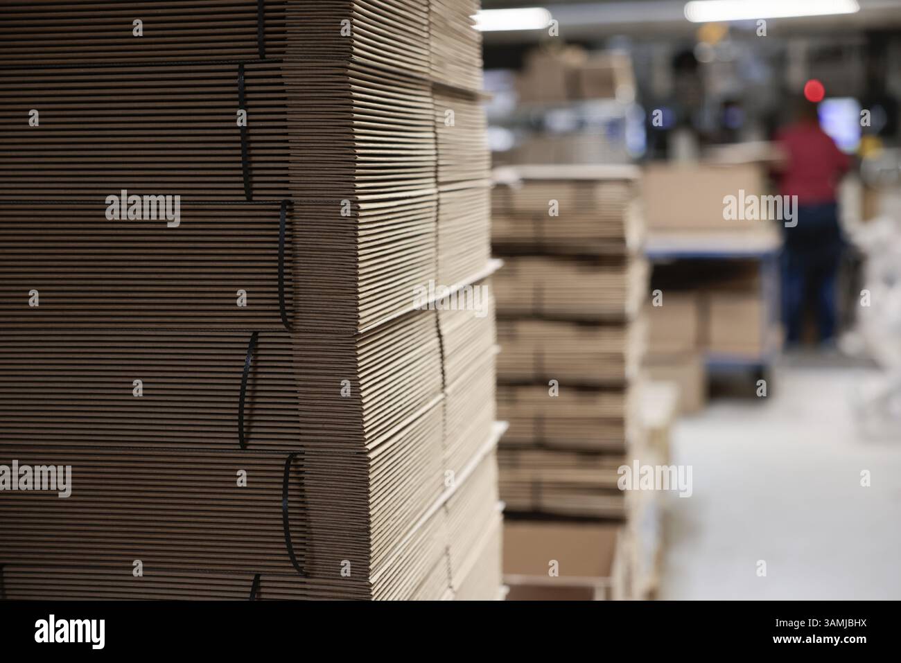 Stack of cardboard boxes, stacked flat boxes for shipping in a ...