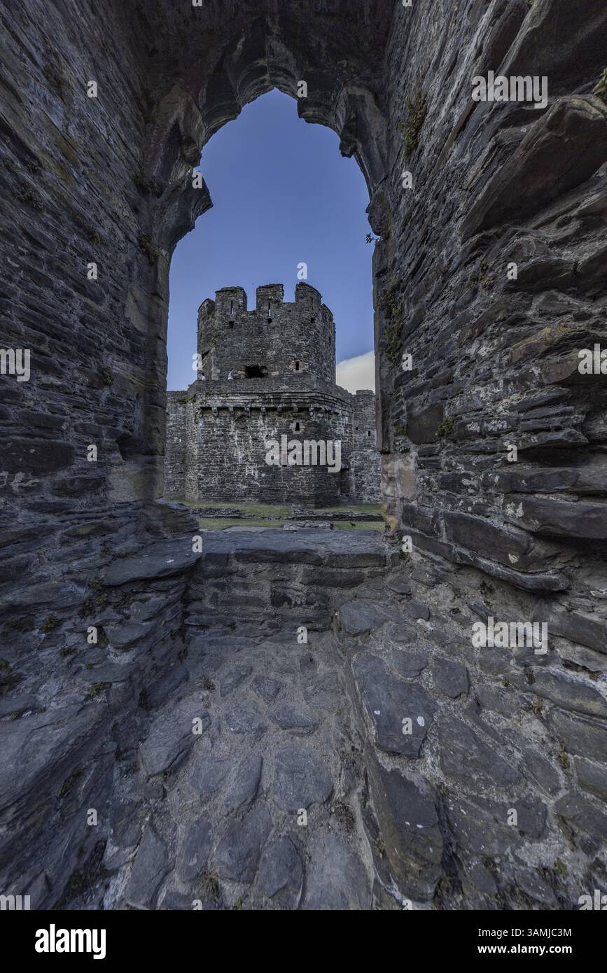 Conwy Castle, view through a window-like opening in the castle wall to ...