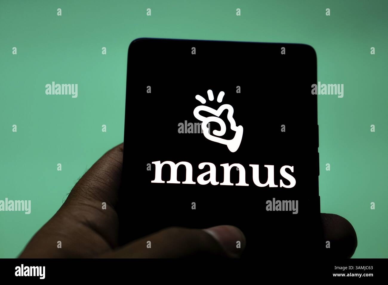 Close up of Manus logo on screen of mobile phone Stock Photo - Alamy
