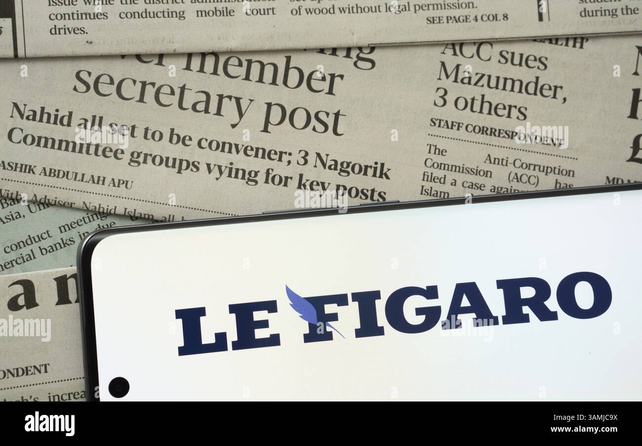 The logo of the le figaro is displayed on a smartphone screen Stock ...
