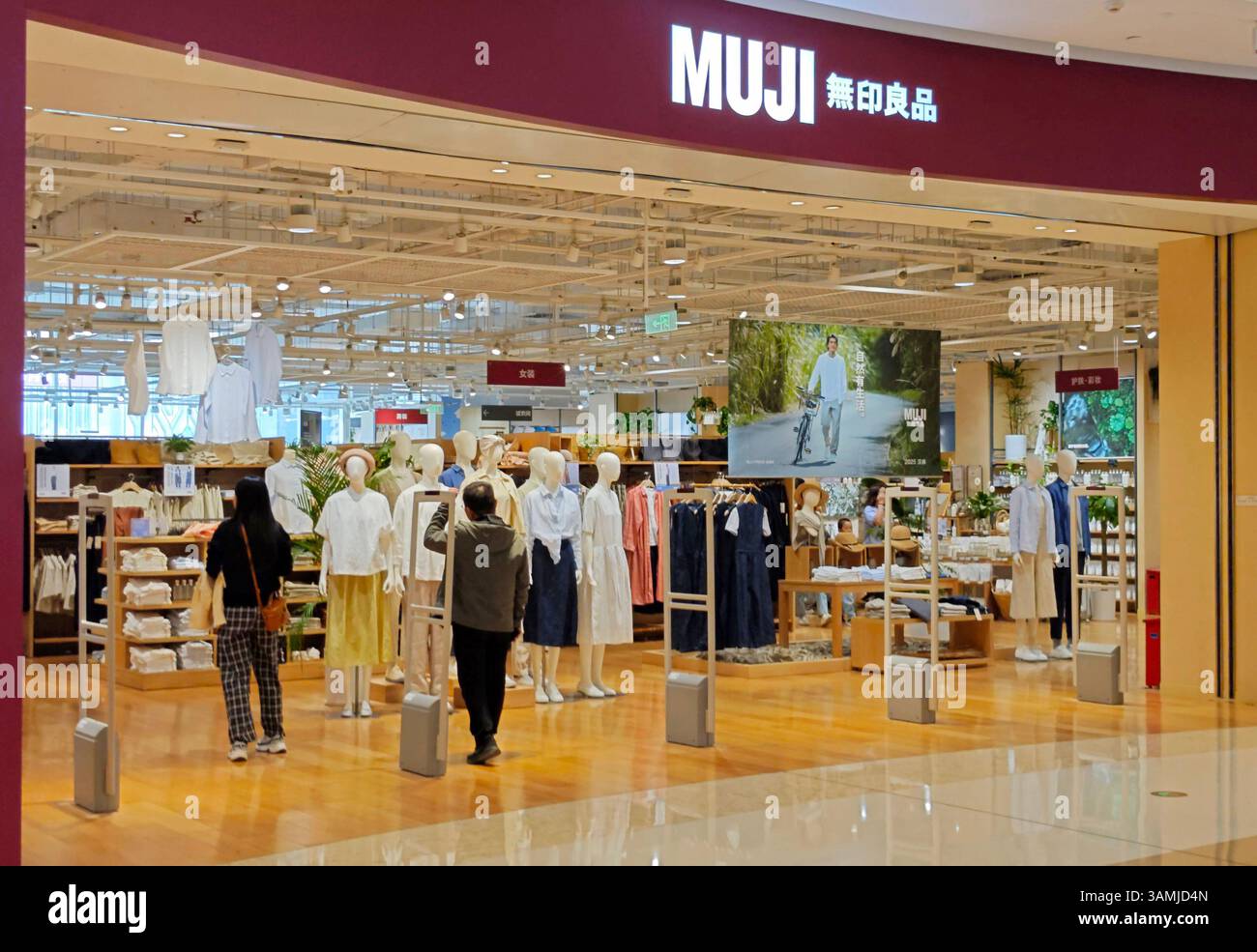 JINAN, CHINA - APRIL 6, 2025 - Customers shop at a Muji store in Jinan ...