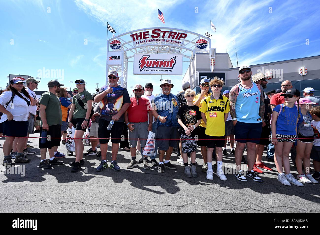 LAS VEGAS, NV - APRIL 13: Drag racing fans wait for the track walk ...