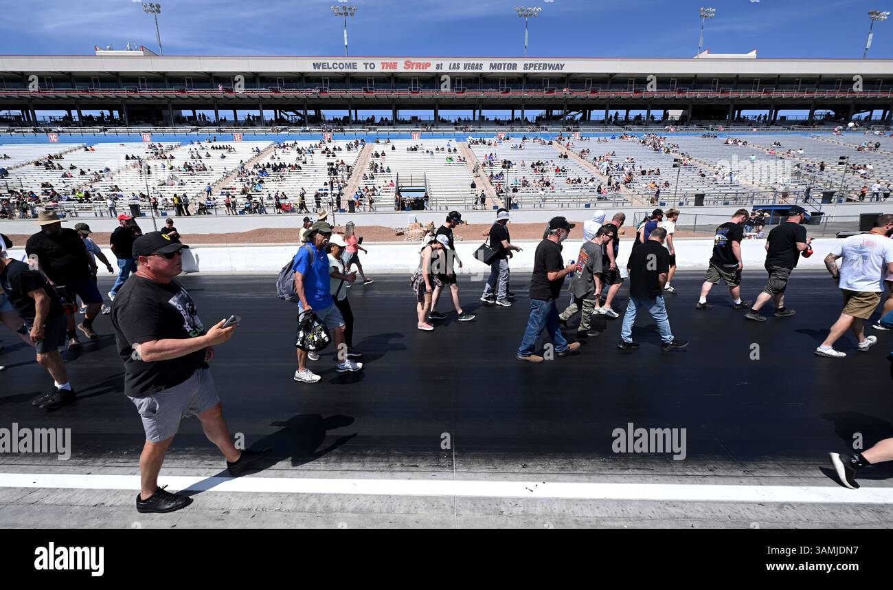 LAS VEGAS, NV - APRIL 13: Drag racing fans take part in the track walk ...