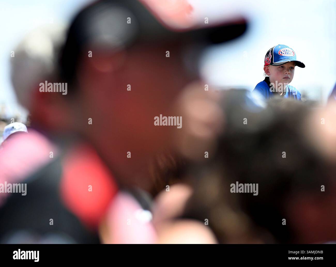 LAS VEGAS, NV - APRIL 13: A young race fan watches pre race ...