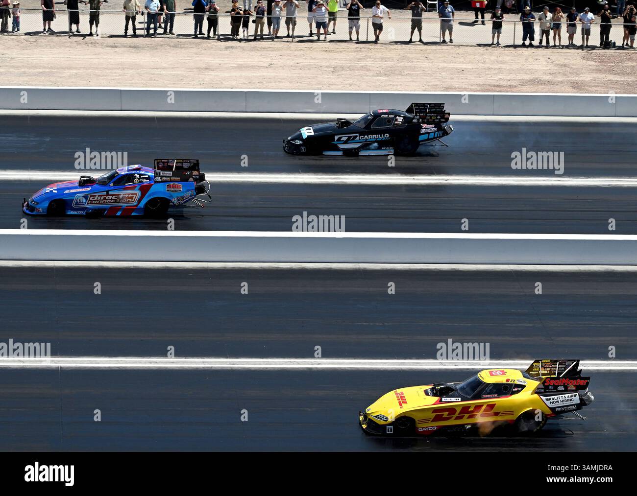LAS VEGAS, NV - APRIL 13: Funny Car drivers, from near lane, J.R. Todd ...