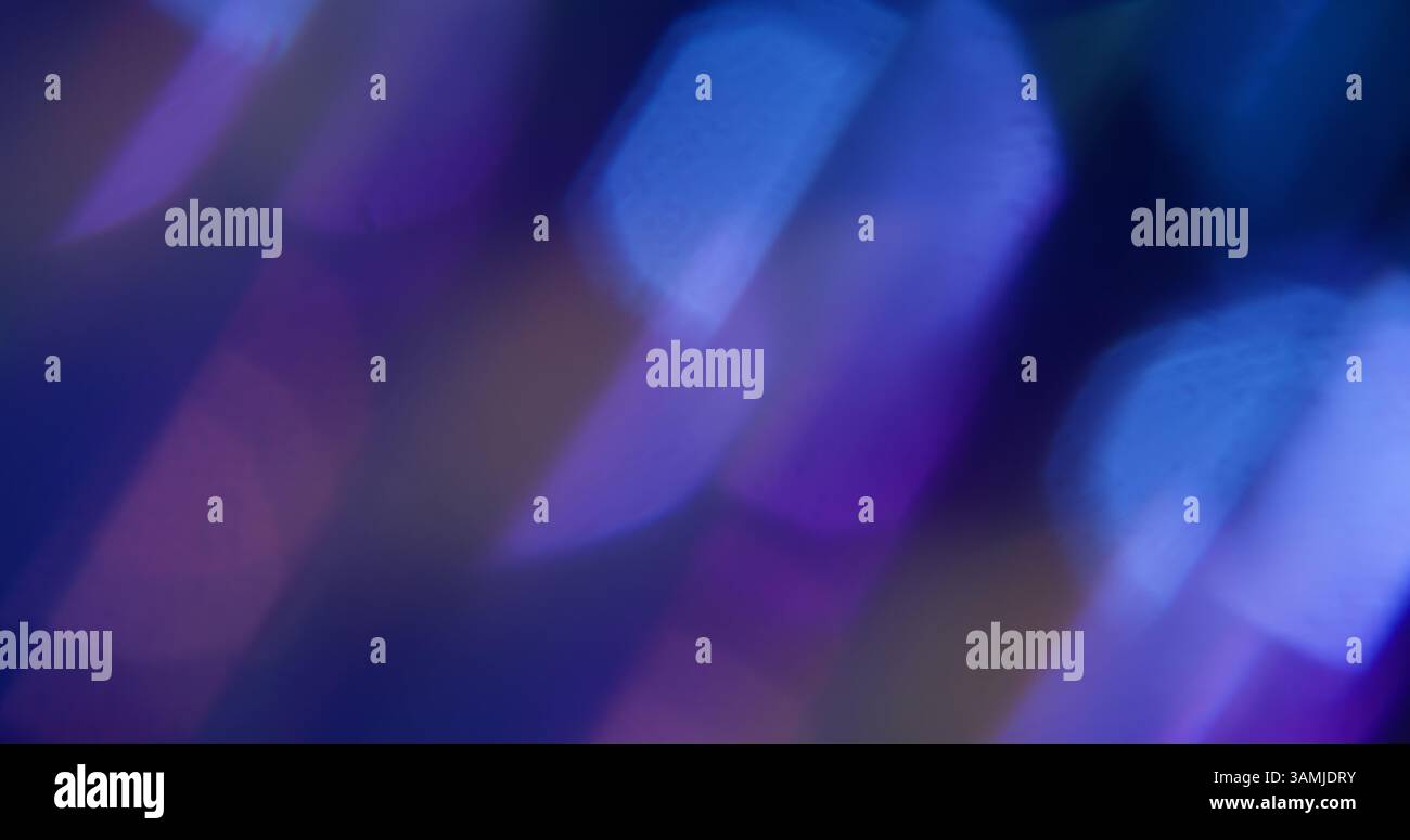 Gleam shiny. Blur abstract lens. Defocused purple blue glint light ...