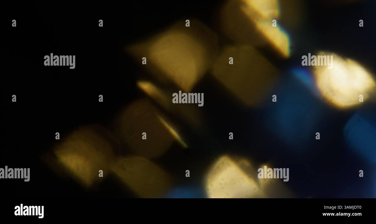 Reflection bokeh. Blur glint. Defocused blue yellow multicolor rainbow ...