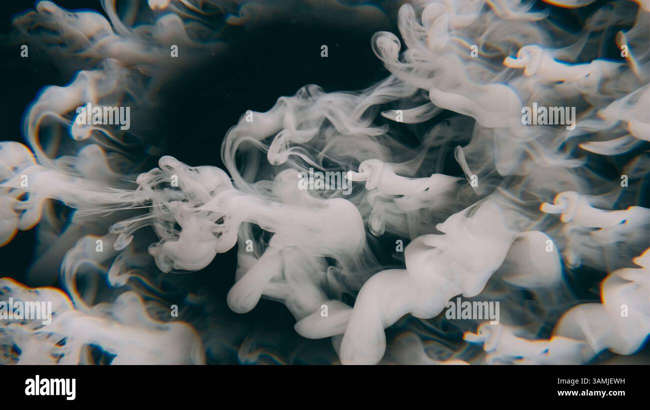 Paint drop. Atmospheric smoke. Defocused white color water flow ...