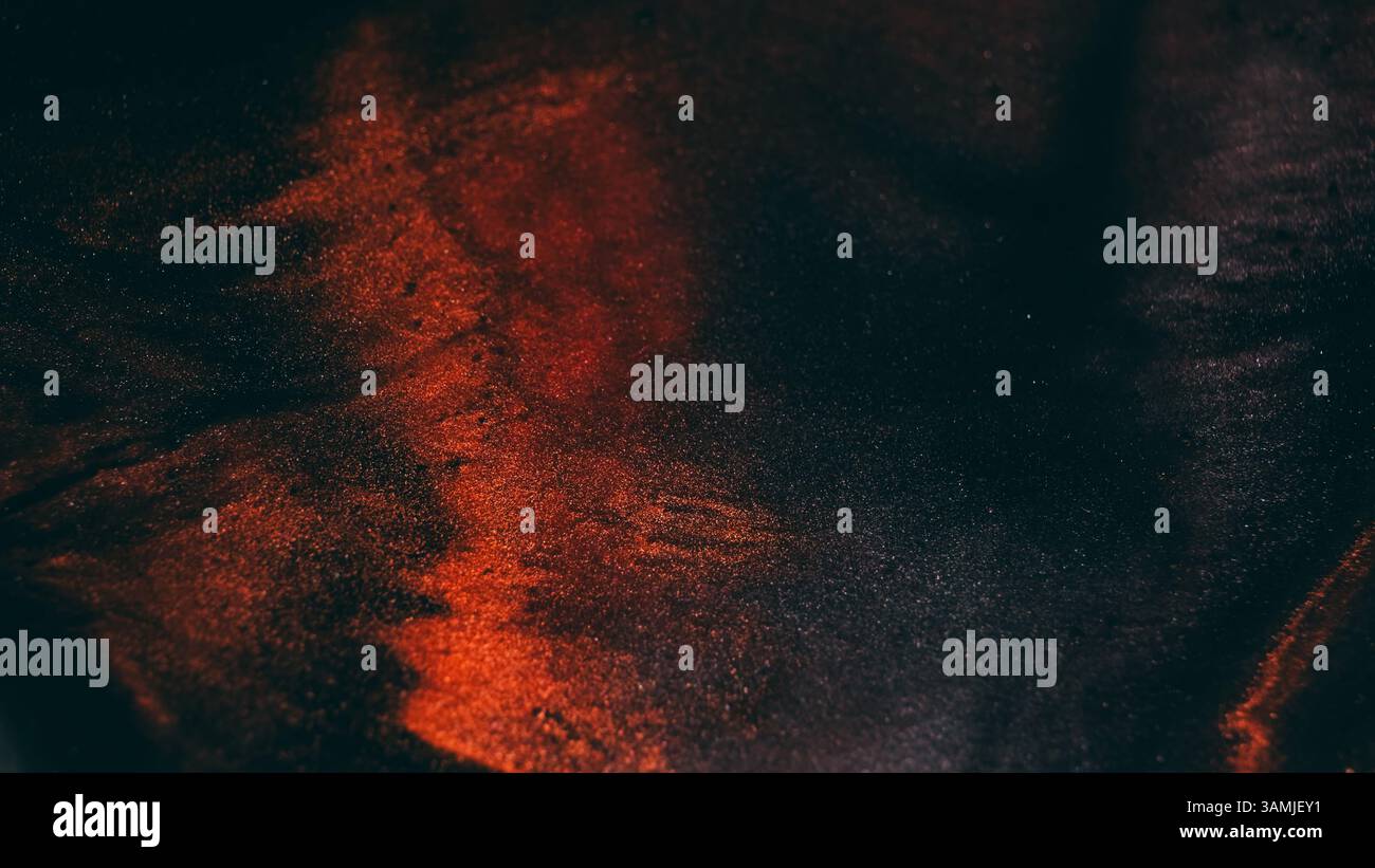 Shiny glitter. Sparkling fluid. Defocused orange bronze color ink in ...