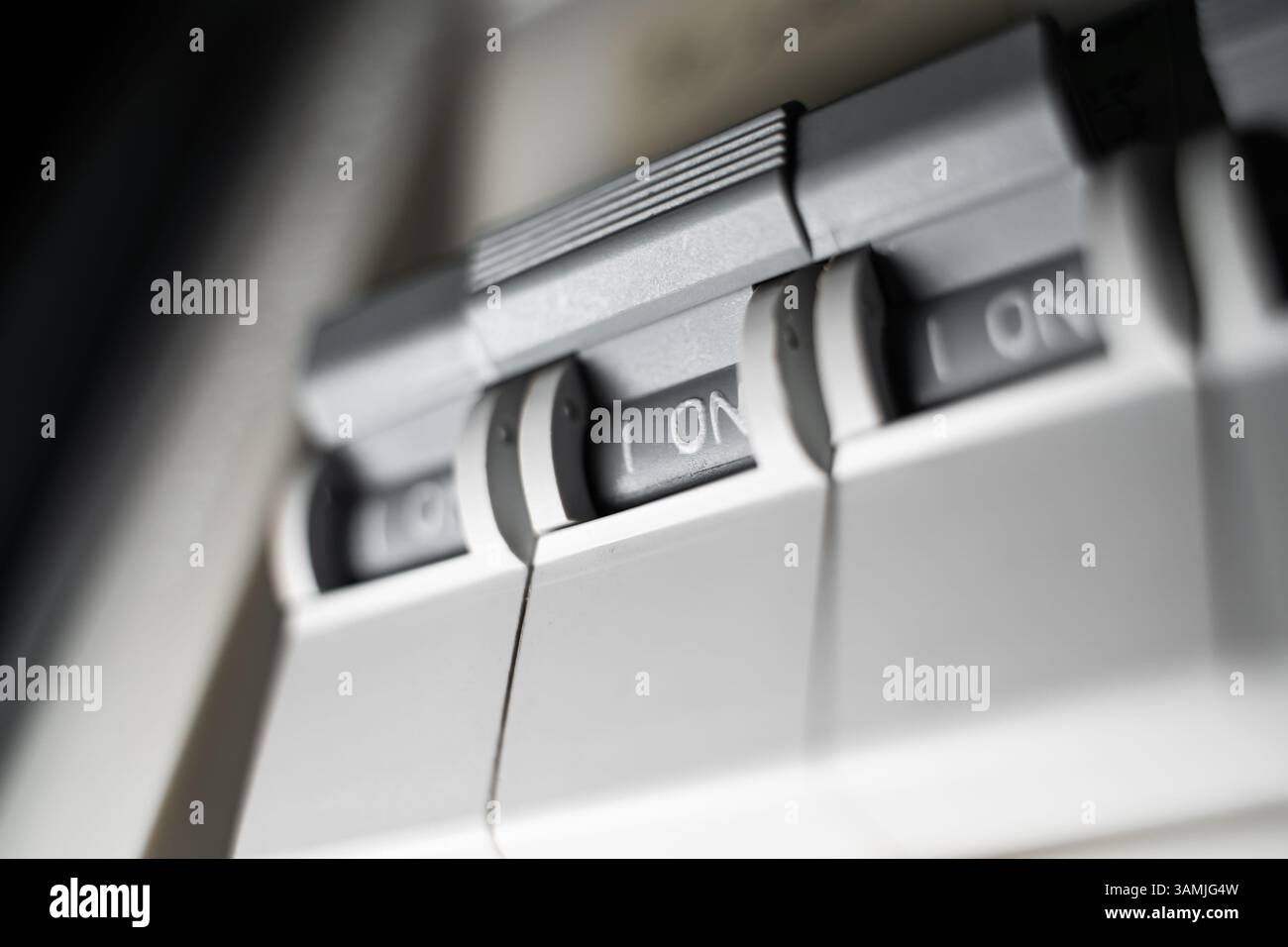 Close-up of a switchboard with a toggle switch turned on Stock Photo ...