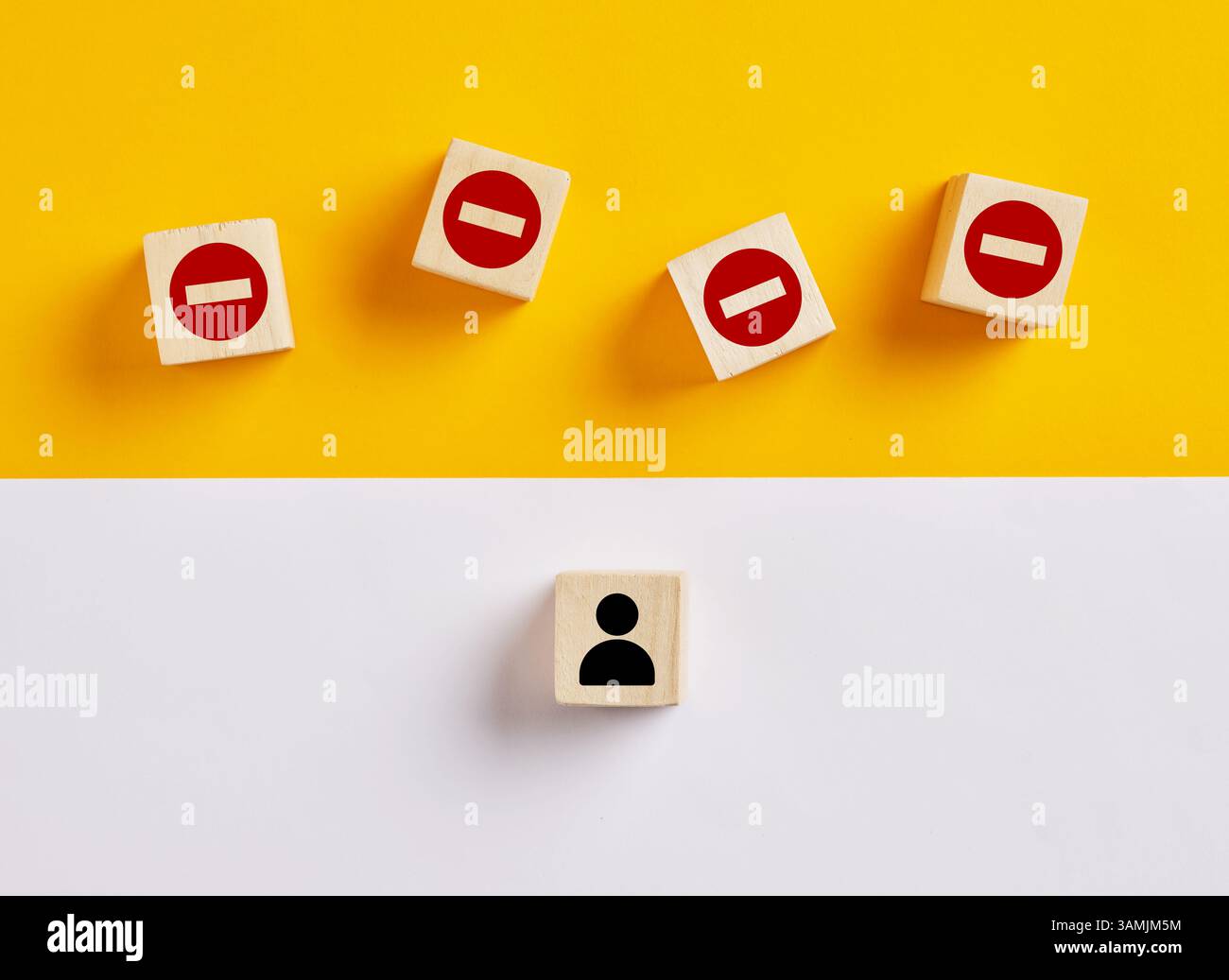 Wooden cubes showing stop signs and a candidate icon, representing job ...