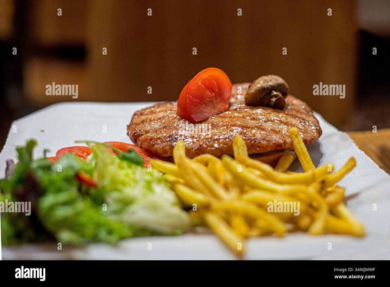 pork chop with french fries and ketchup Stock Photo - Alamy