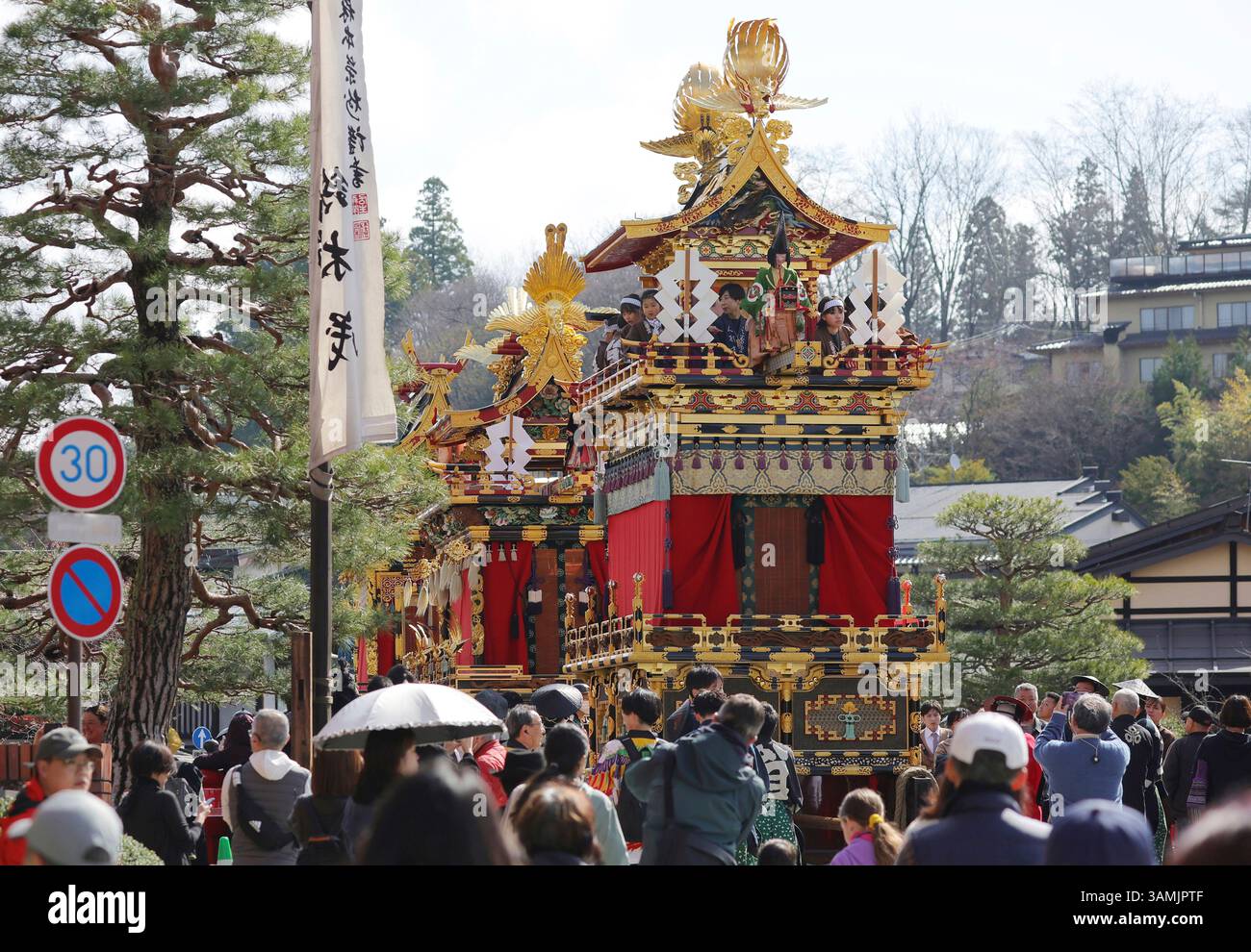 Festival floats called "Yatai" move through the city during the Spring ...