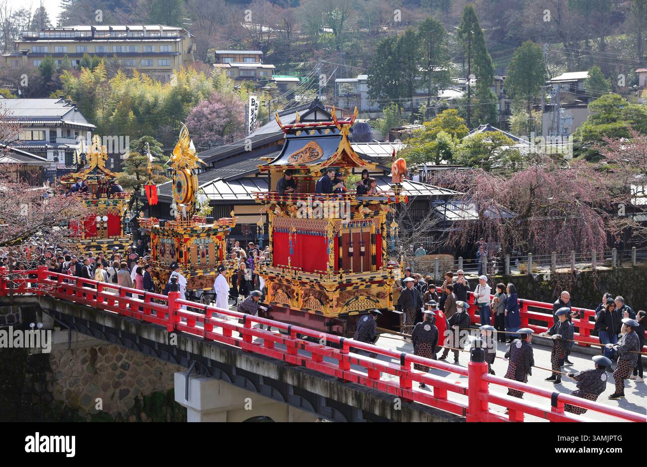 Festival floats called "Yatai" move through the city during the Spring ...
