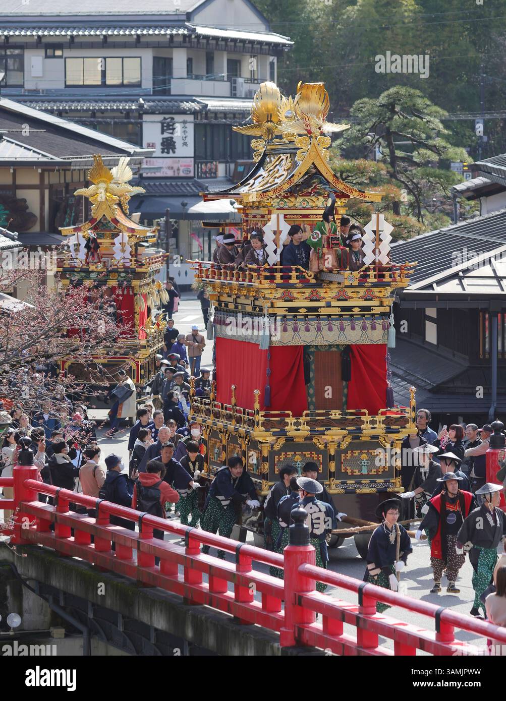 Festival floats called "Yatai" move through the city during the Spring ...
