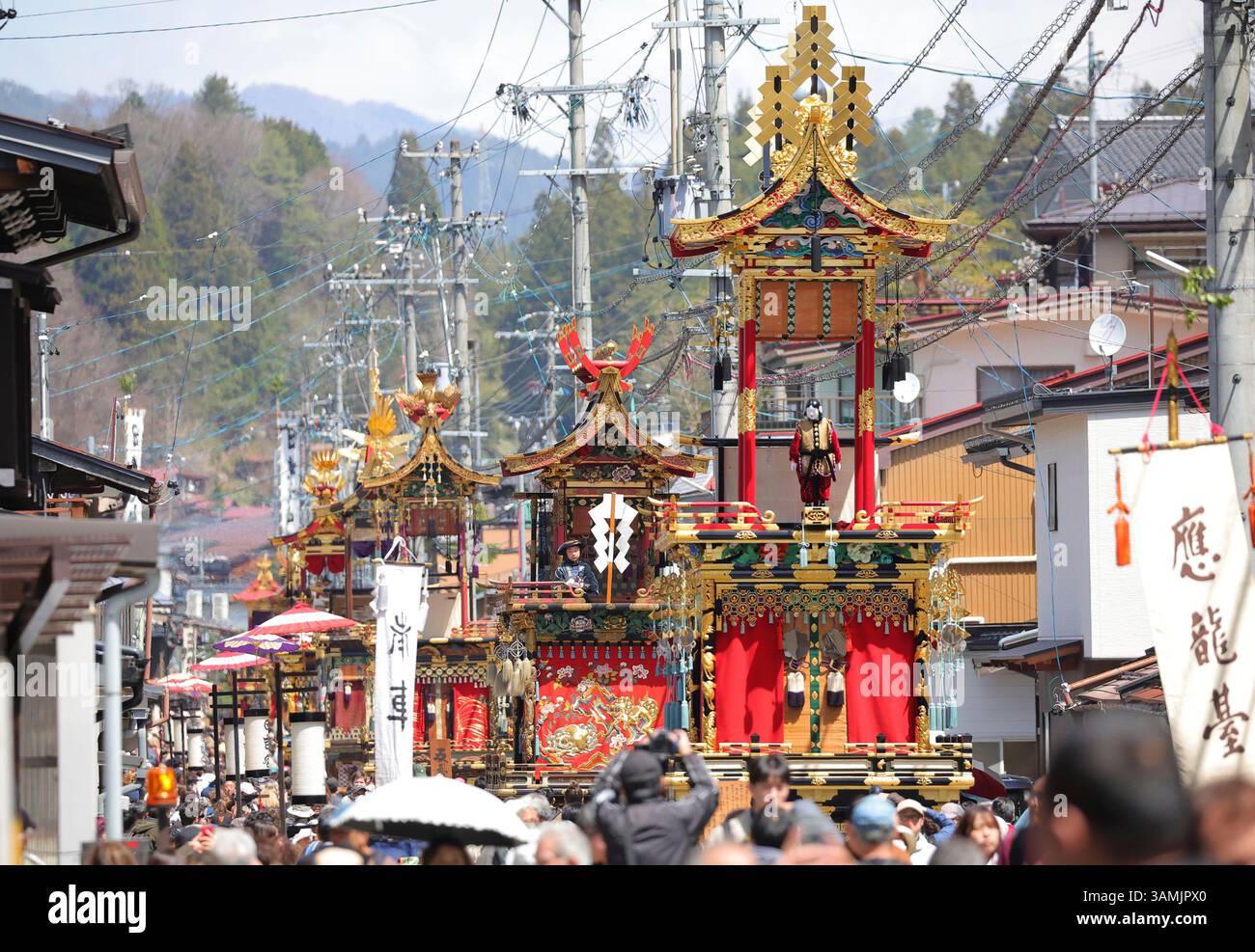 Festival floats called "Yatai" move through the city during the Spring ...