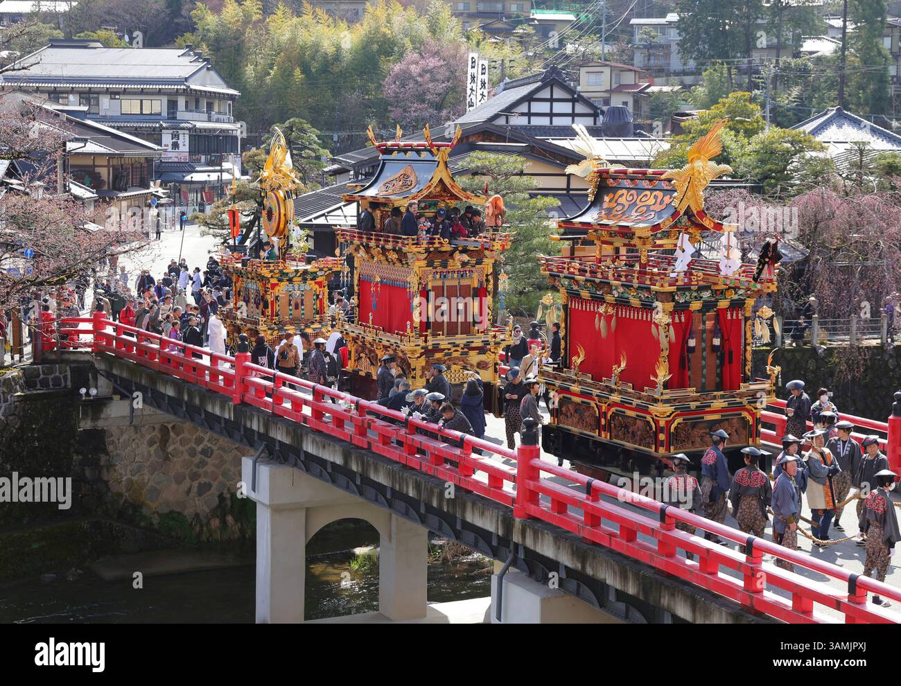 Festival floats called "Yatai" move through the city during the Spring ...