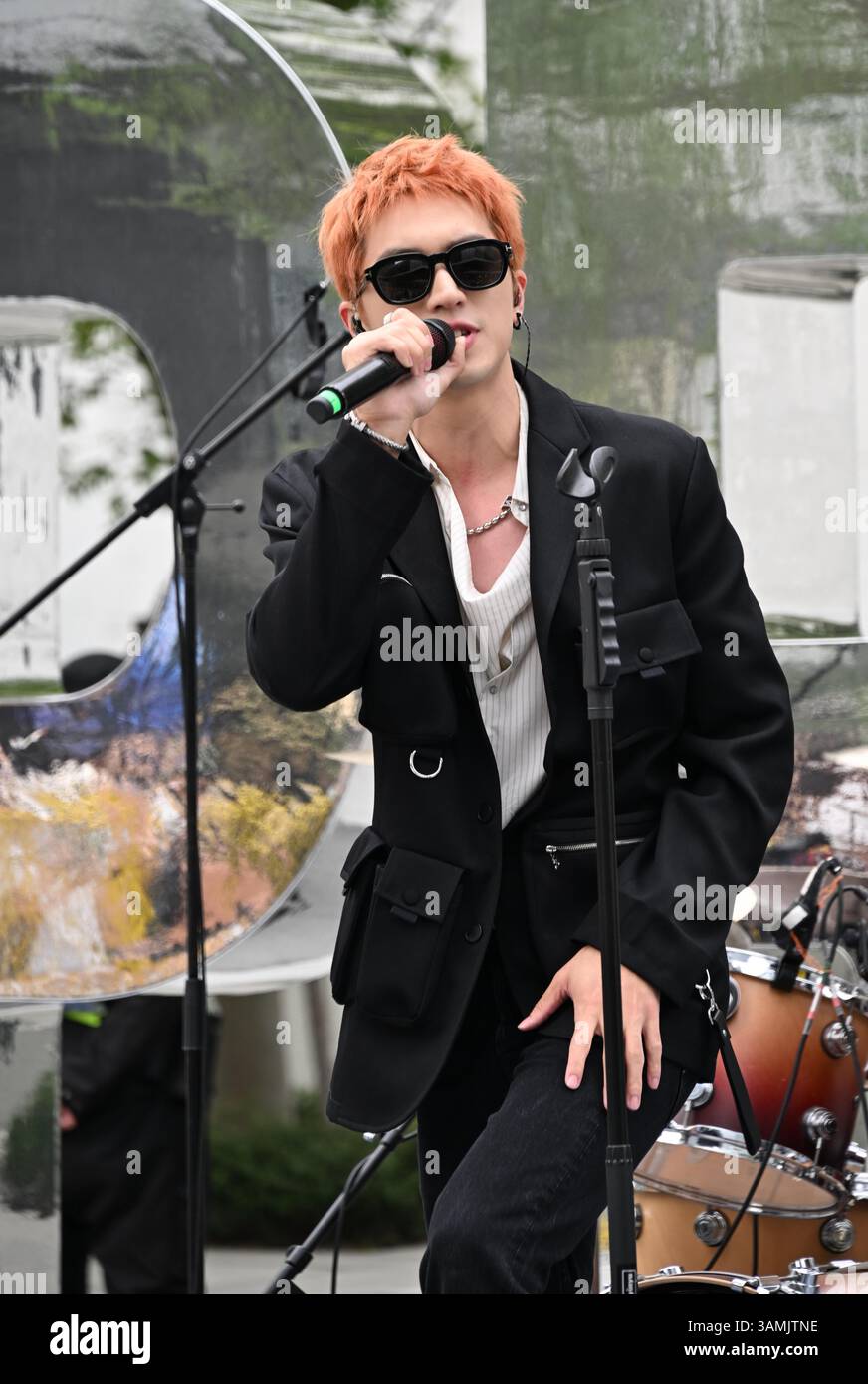 Chinese actor and singer Xu Weizhou attends an activity in Shanghai ...