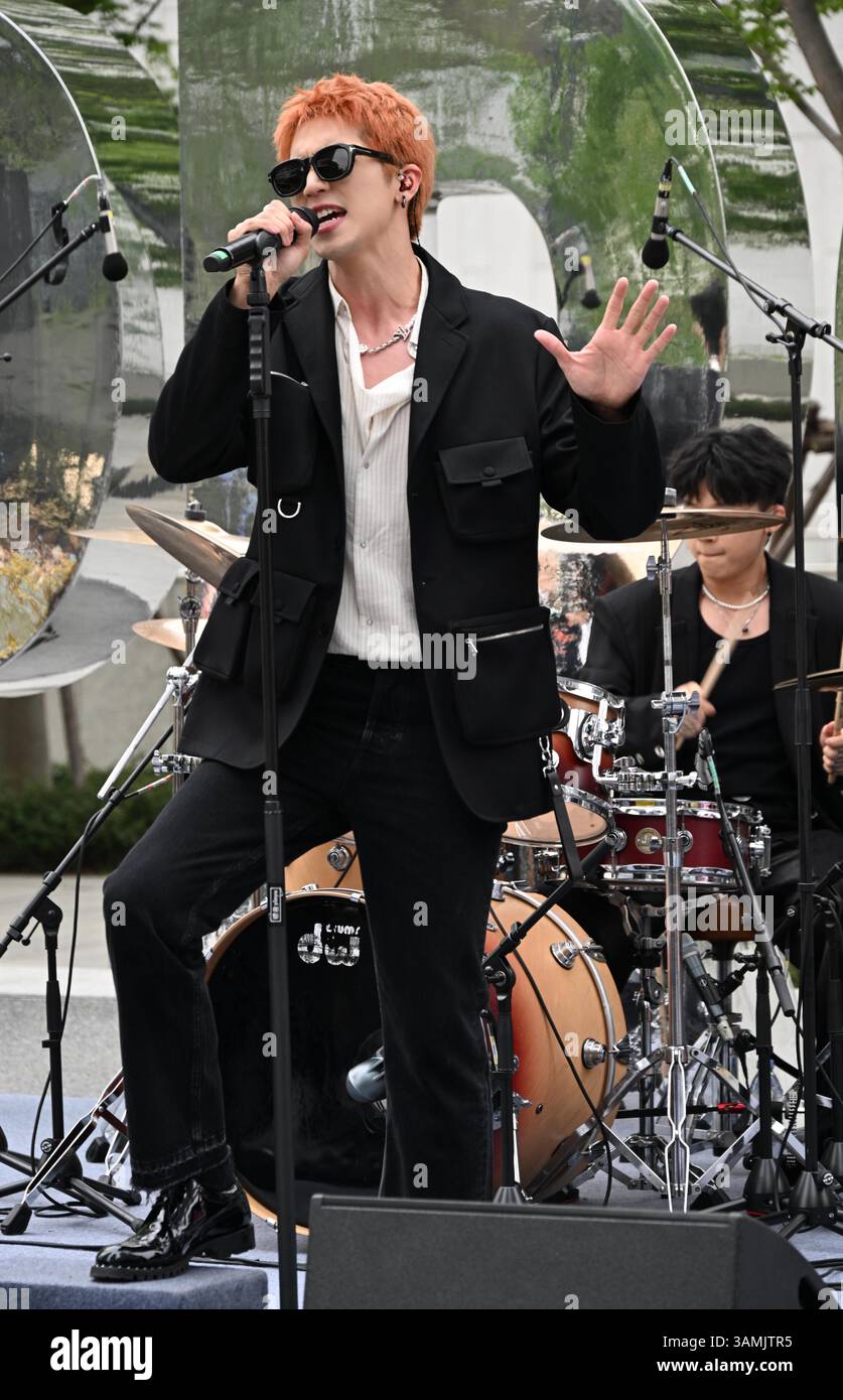 Chinese actor and singer Xu Weizhou attends an activity in Shanghai ...