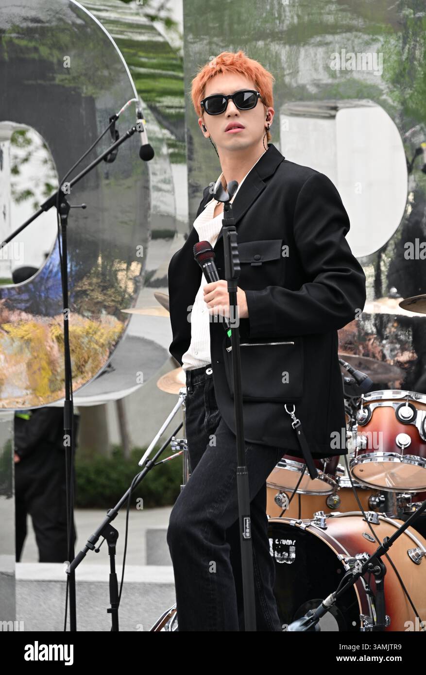 Chinese actor and singer Xu Weizhou attends an activity in Shanghai ...