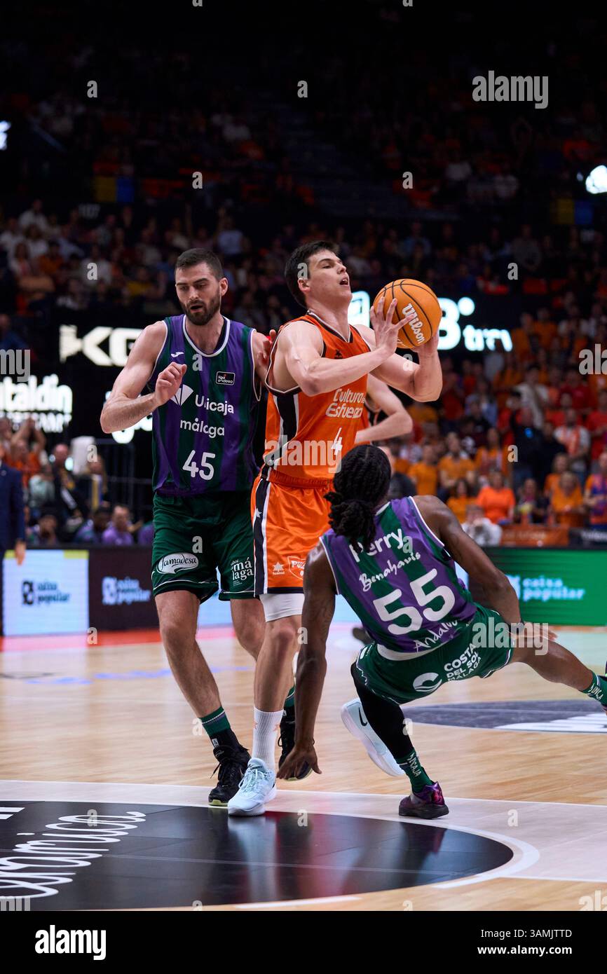 Valencia, Spain. 13th Apr, 2025. Jaime Pradilla of Valencia basket and Kendrick Perry of ...
