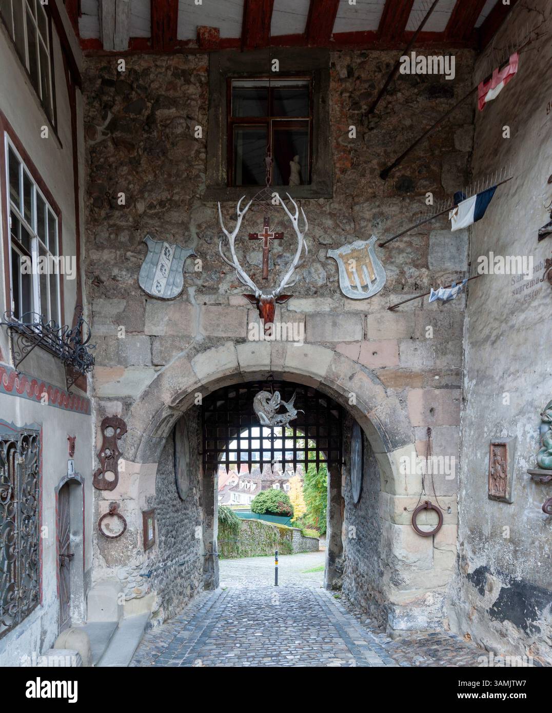 Entrance archway to the Old Castle in Bregenz, Austria, with historical ...