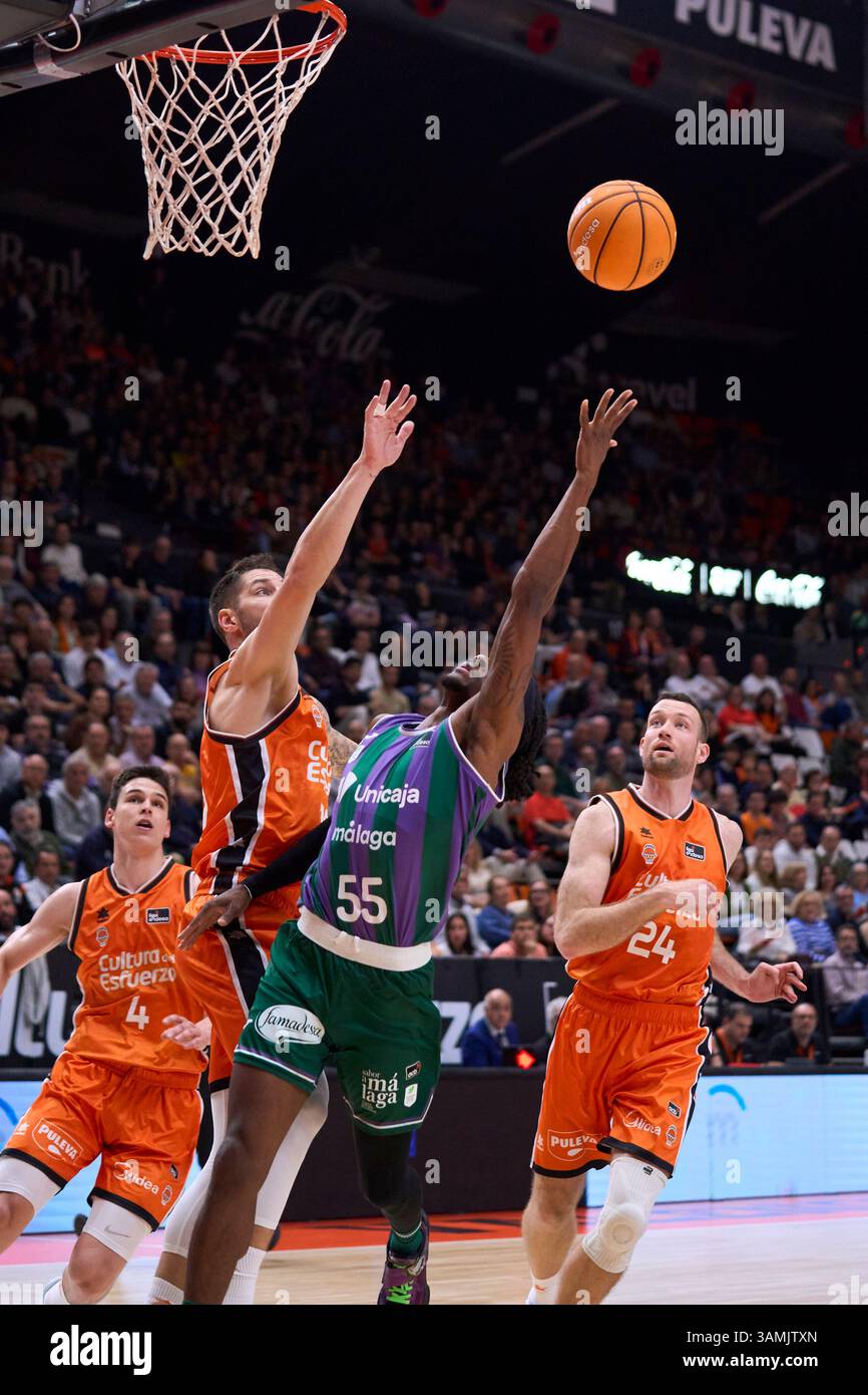 Valencia, Spain. 13th Apr, 2025. Kendrick Perry of Fundacion Unicaja and Jaime Pradilla of ...