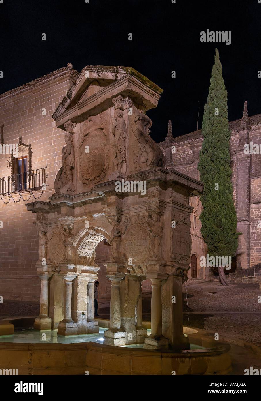 Font of Santa Maria in Baeza, Spain. A stone fountain with a tree ...