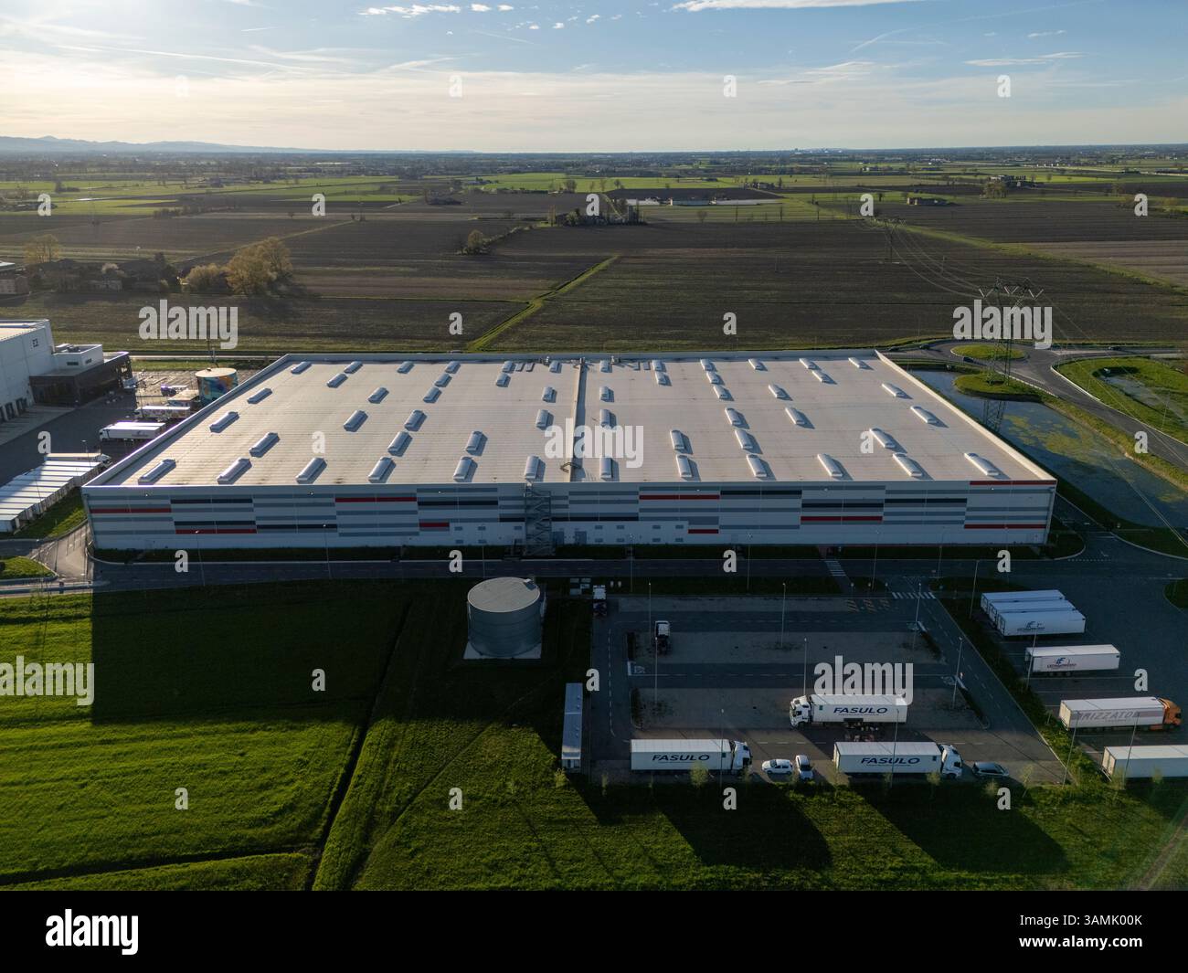 PC, Italy - March 26th 2025 - Aerial view of a large automated cold ...