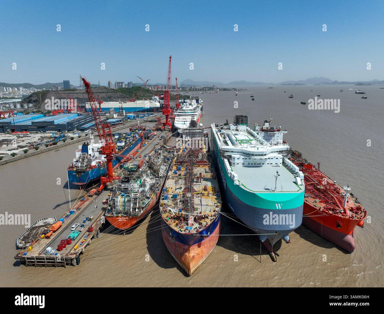 ZHOUSHAN, CHINA - APRIL 14, 2025 - Workers repair a ship at a ship ...