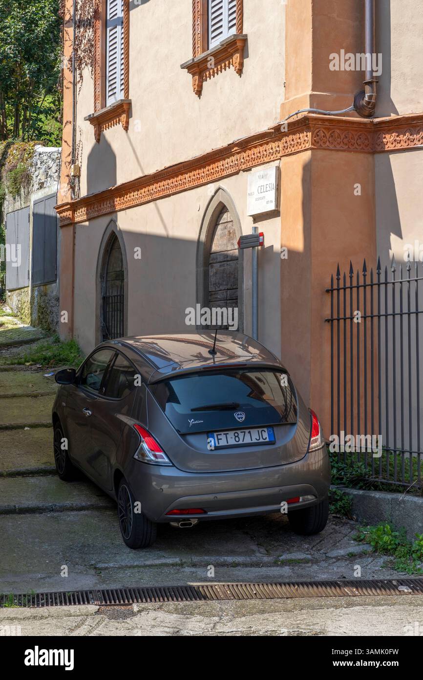 Como, Italy - April 4, 2025: Still life with a small hatchback at the ...