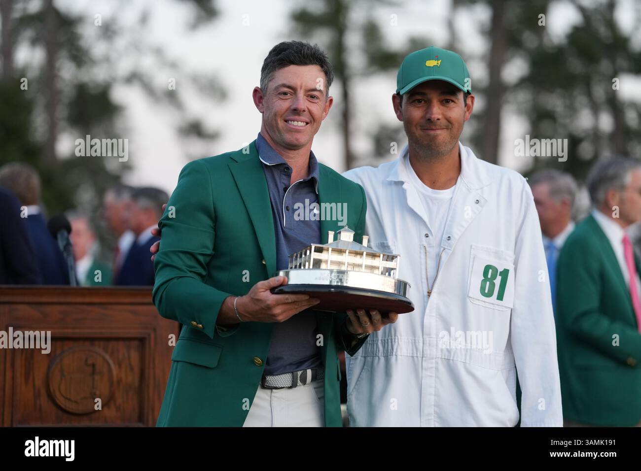 Augusta, USA. 13th Apr, 2025. Rory McIlroy (L) of Northern Ireland ...