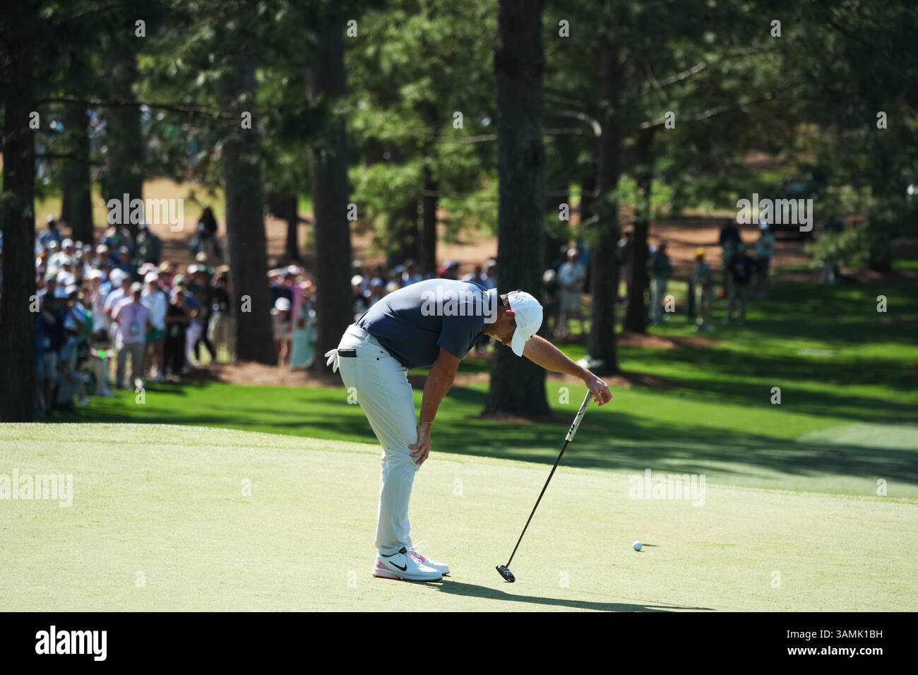 Augusta, USA. 13th Apr, 2025. Rory McIlroy of Northern Ireland reacts ...