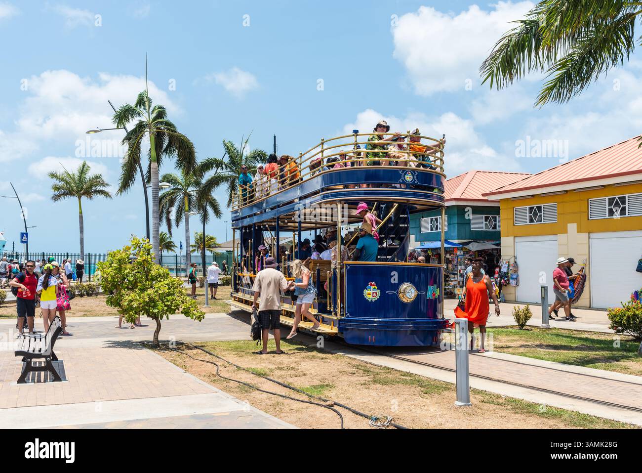Oranjestad, Aruba - April 11, 2024: Tourist boarding and riding on Free ...