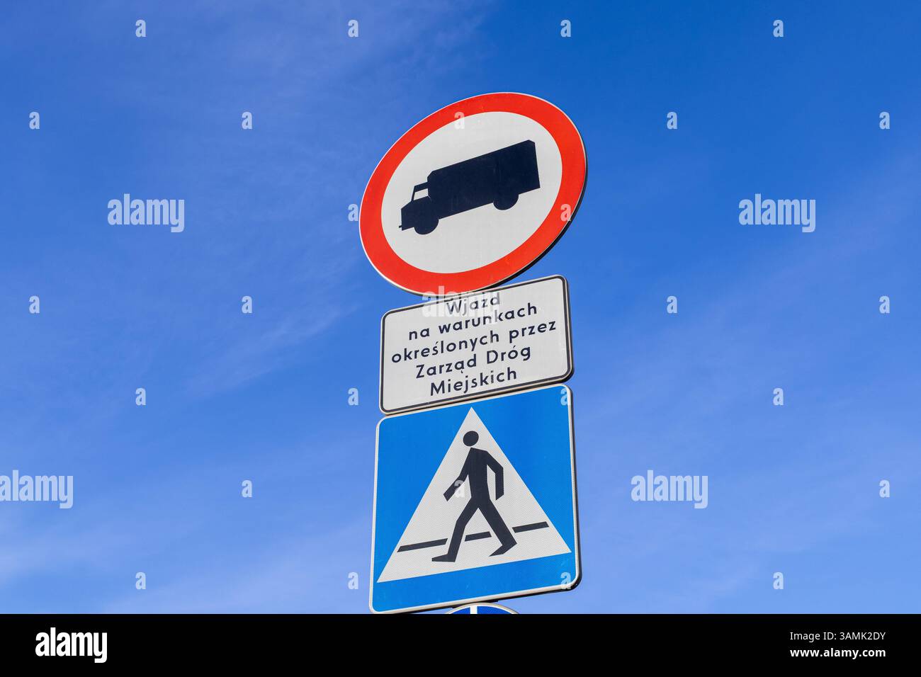 Vertical view of traffic signs in Poland showing a truck restriction ...